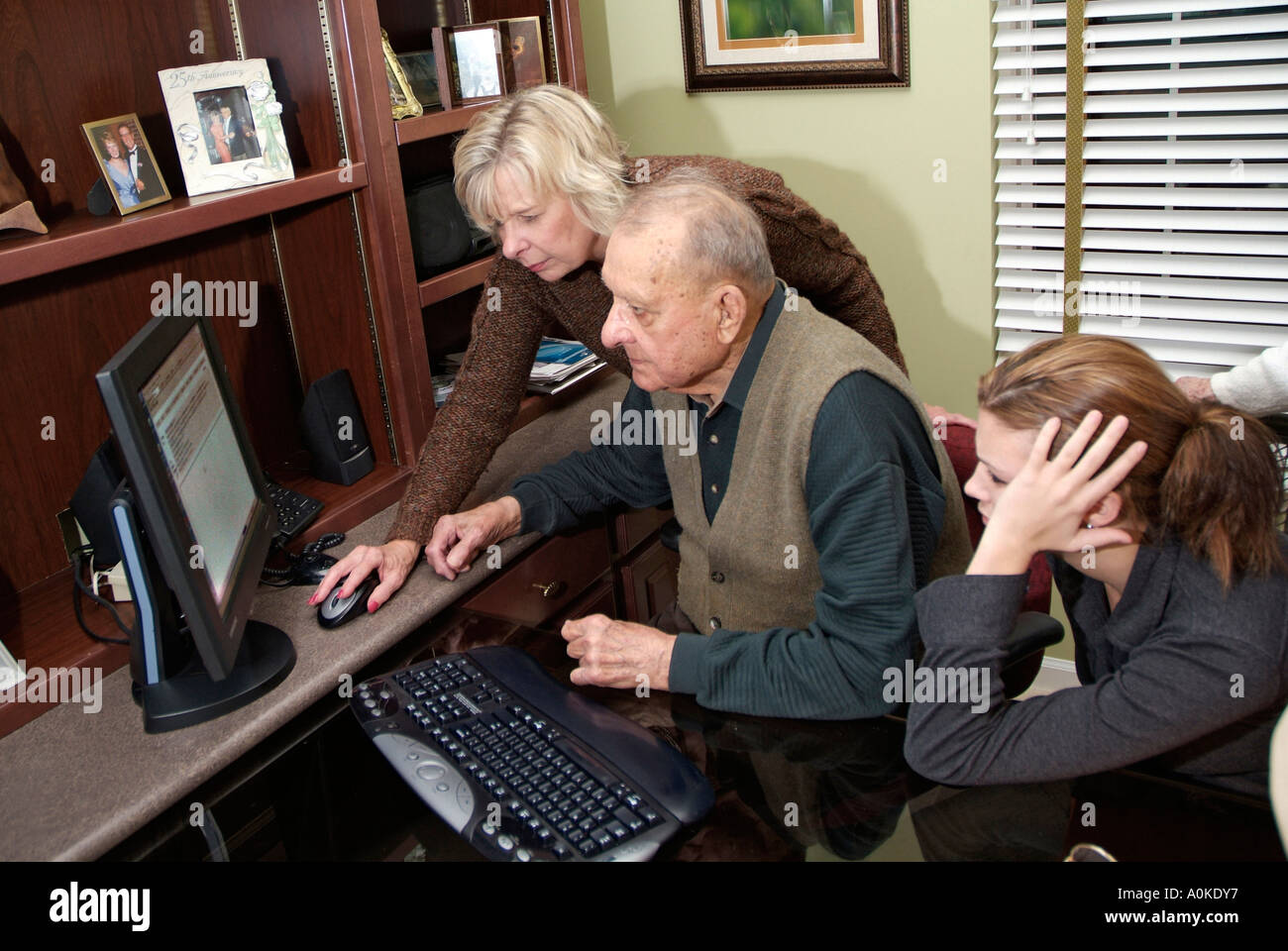 Adult daughter teaches senior citizen parents how to surf the internet ...