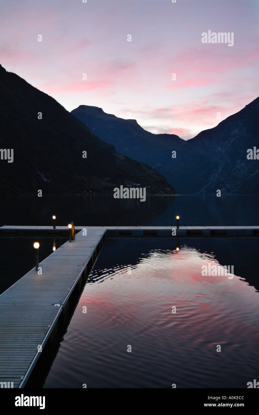 Sunset on the jetty at Geiranger Geirangerfjorden More and Romsdal ...