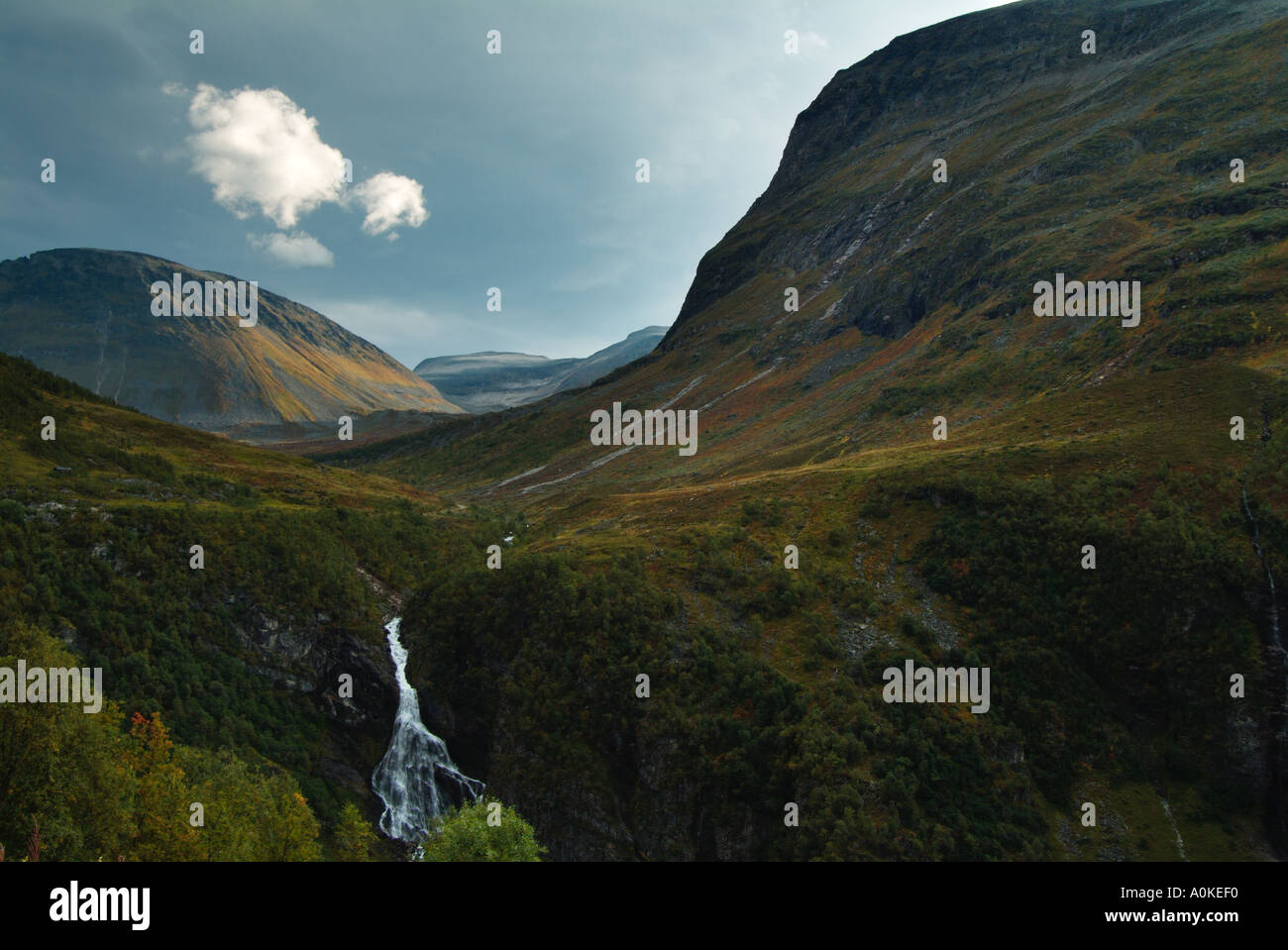 Mountain and waterfall surrounding Geirangerfjorden More and Romsdal ...
