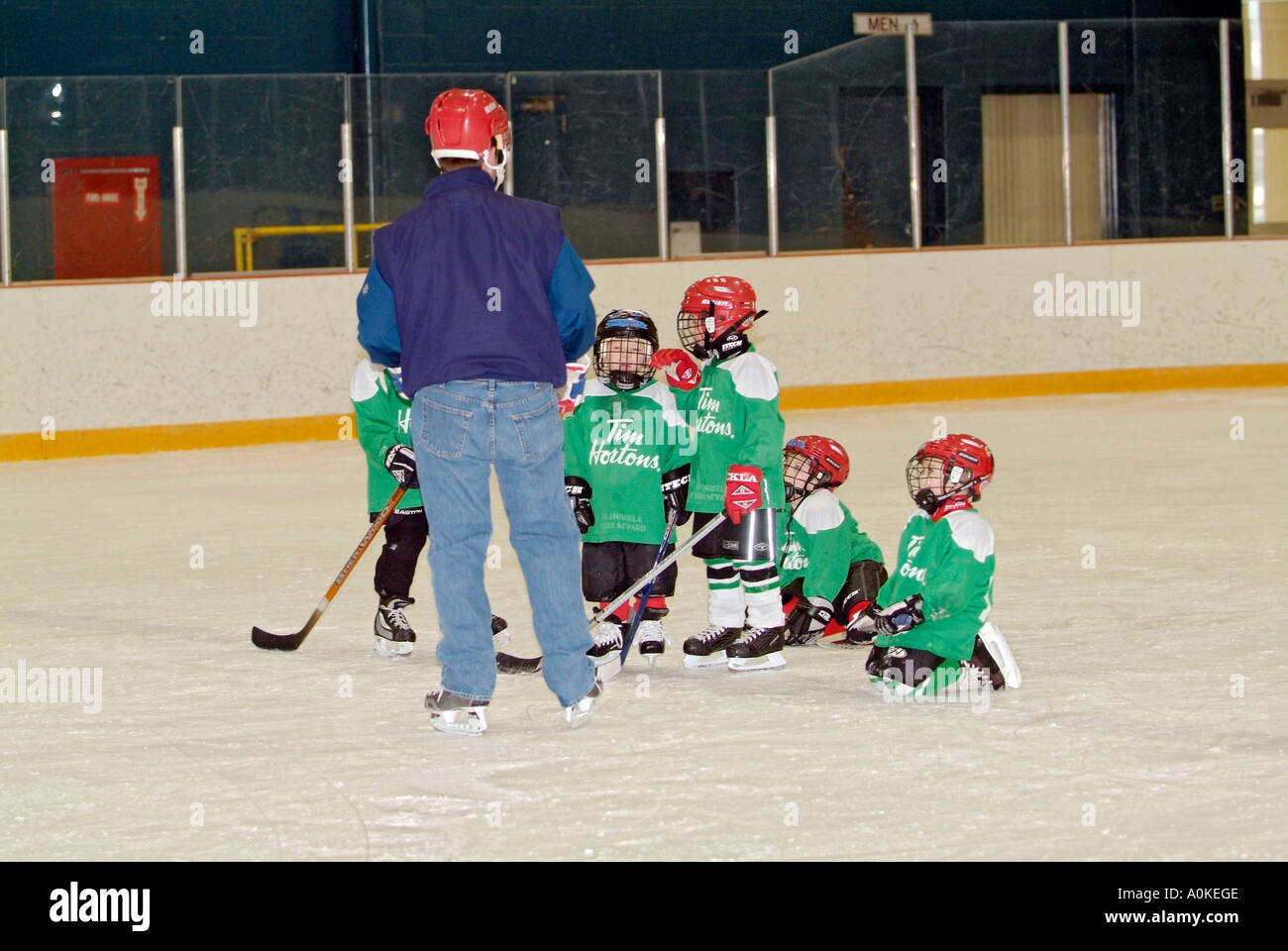 5 year old boys and girls are learning the fundamentals of playing ice ...