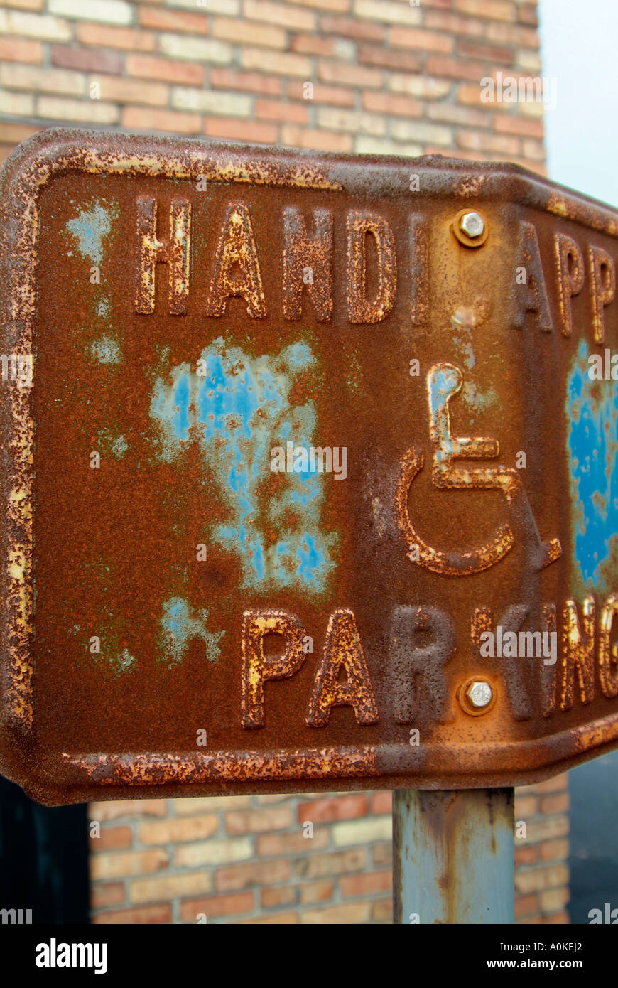 Old weathered rusty handicapped parking sign Stock Photo - Alamy