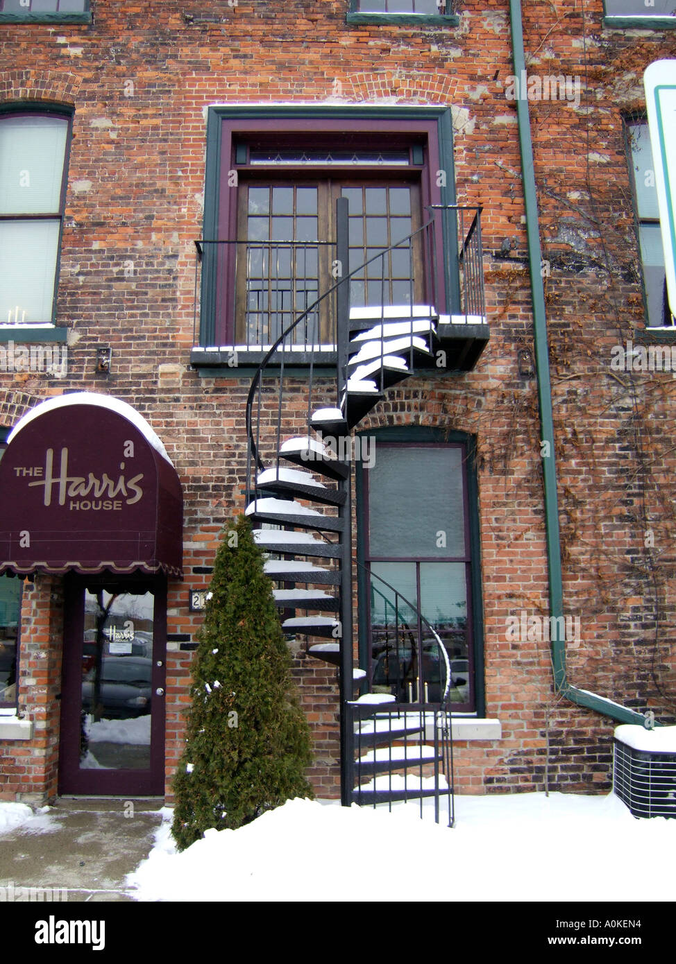 Stairs wind from the ground to the second story in an old brick ...