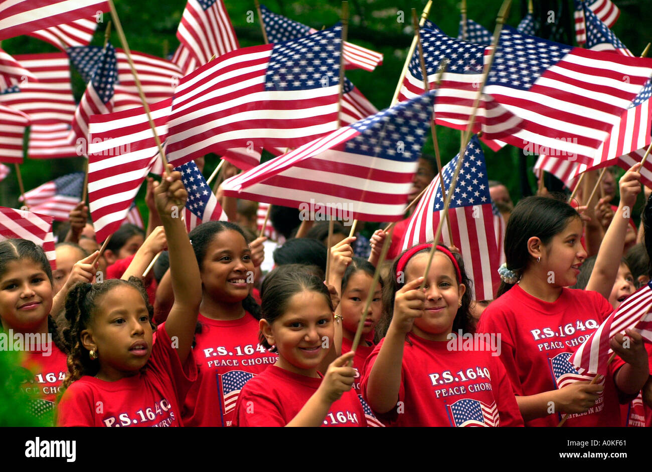 School children wave flags hi-res stock photography and images - Alamy