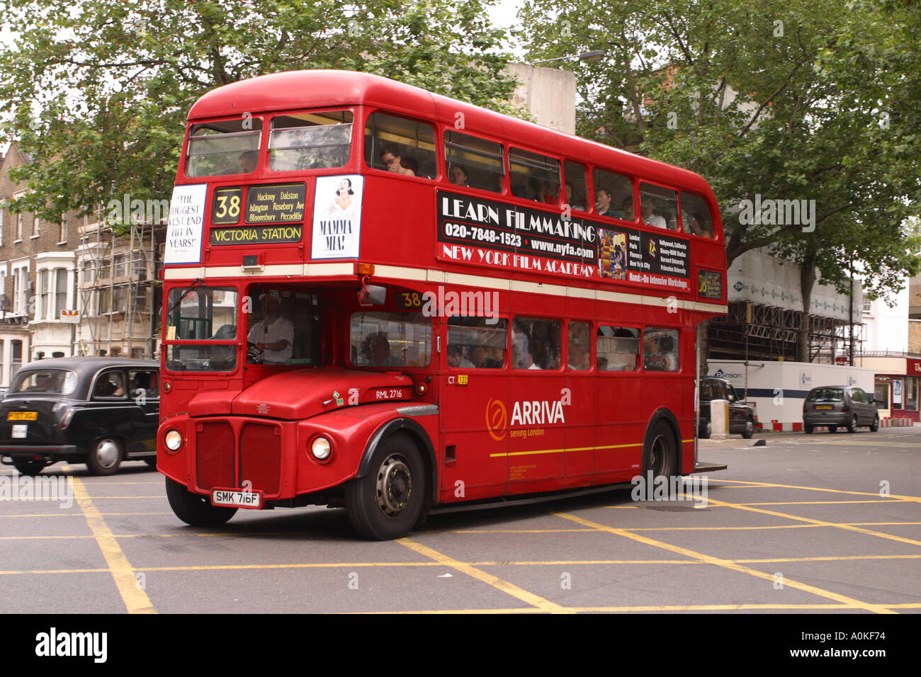 London Double decker bus Routemaster driving through the streets of ...