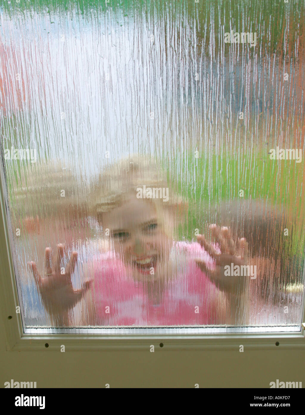 YOUNG GIRLS AT WINDOW Stock Photo - Alamy