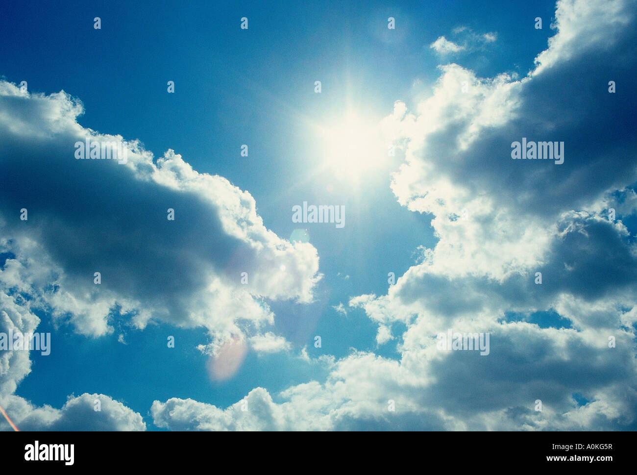 Sun and clouds Stock Photo - Alamy