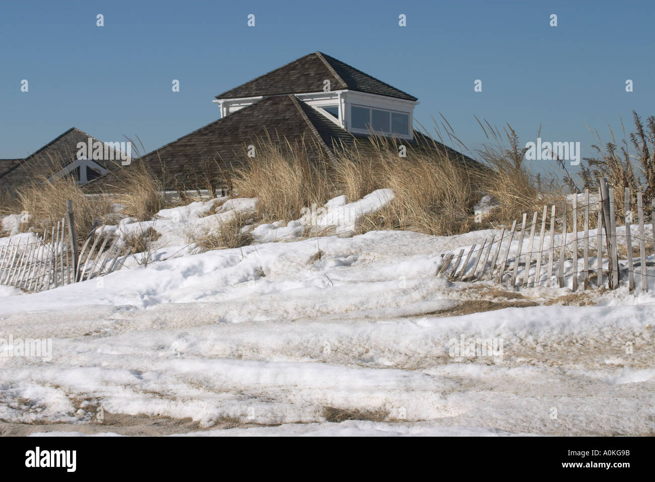 House on the beach in the snow Stock Photo - Alamy