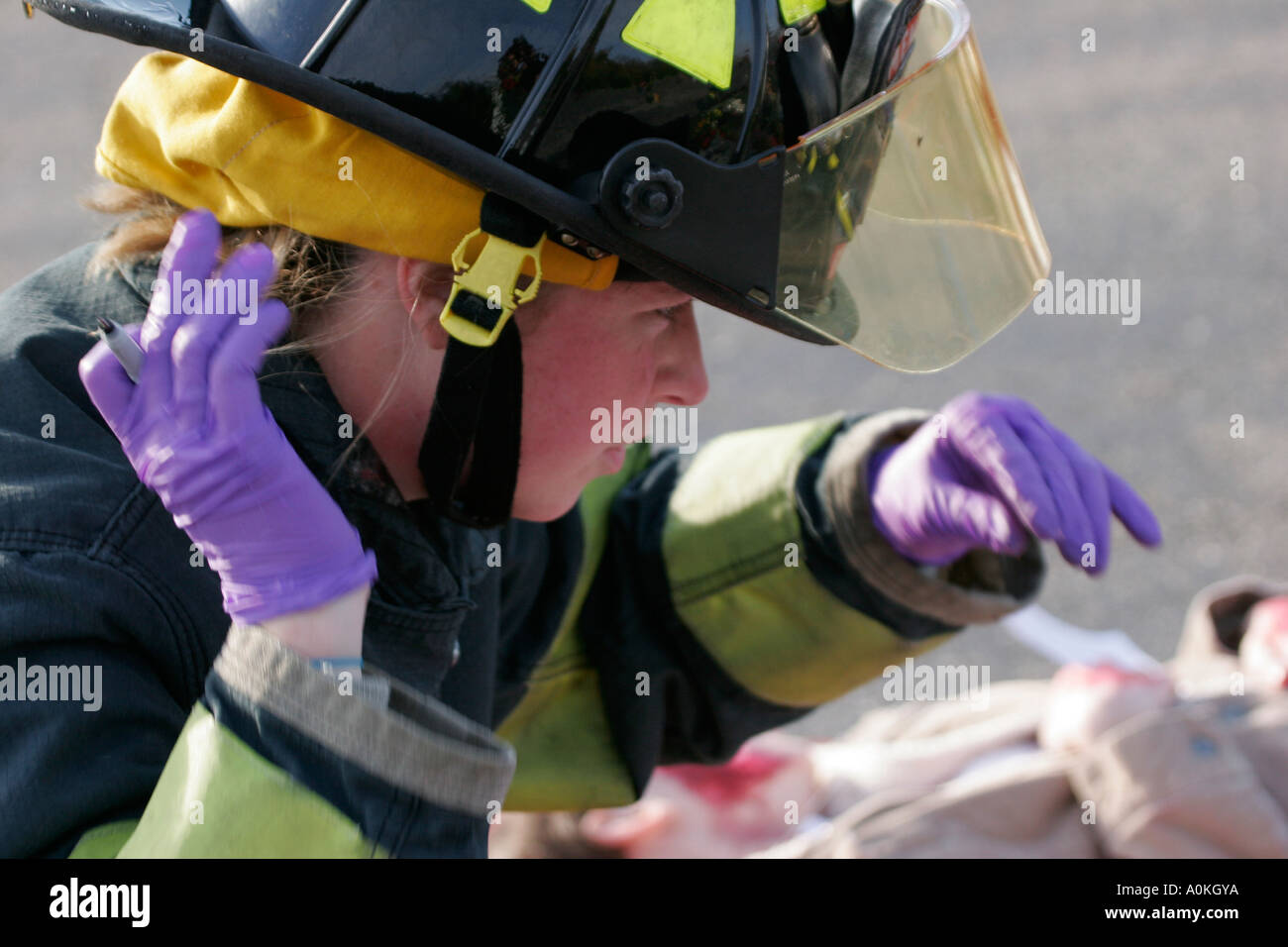 Women EMT doing assessments of victims at a mass casualty scene Stock ...