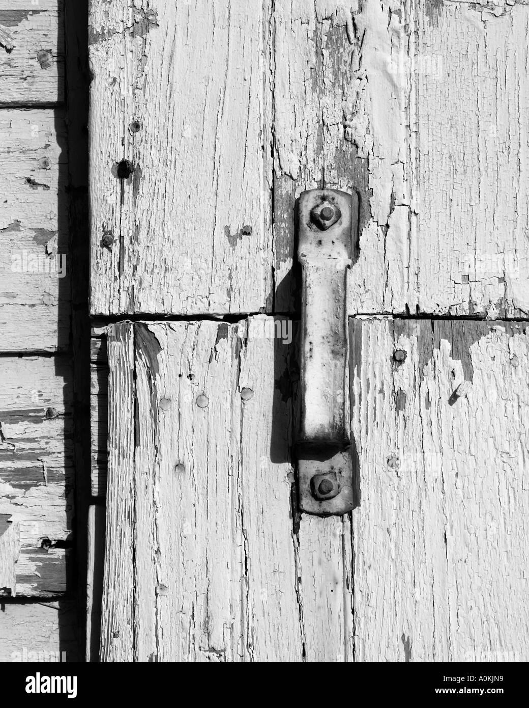 Detail in white. Door latch on New York garage, USA Stock Photo - Alamy