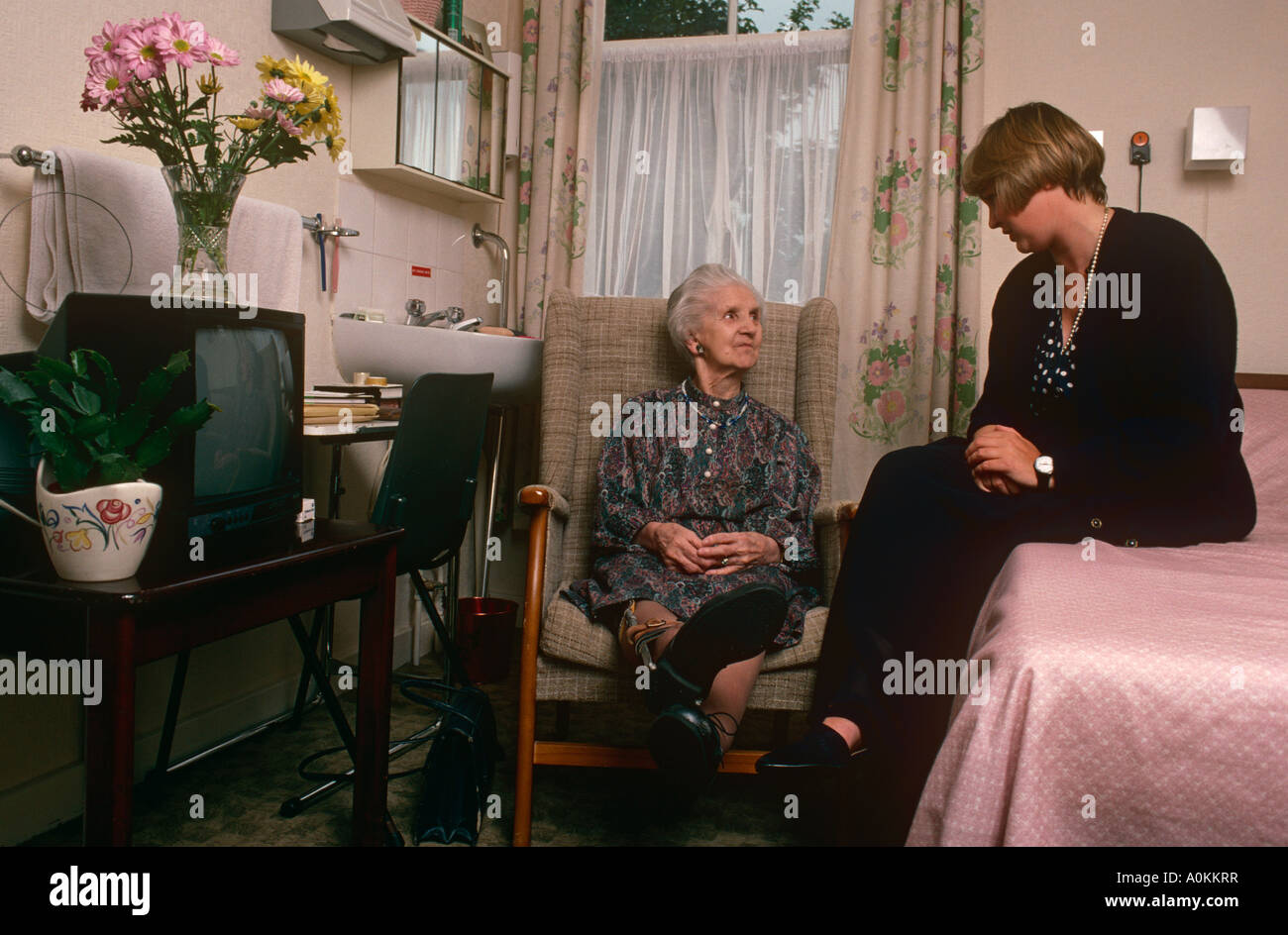 A nursing home inspector, social worker visits an old lady in a ...