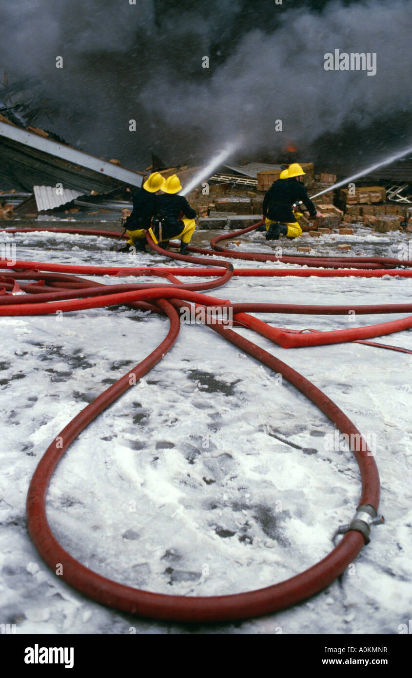 Firemen douse a factory fire in Colindale, North London UK Stock Photo ...