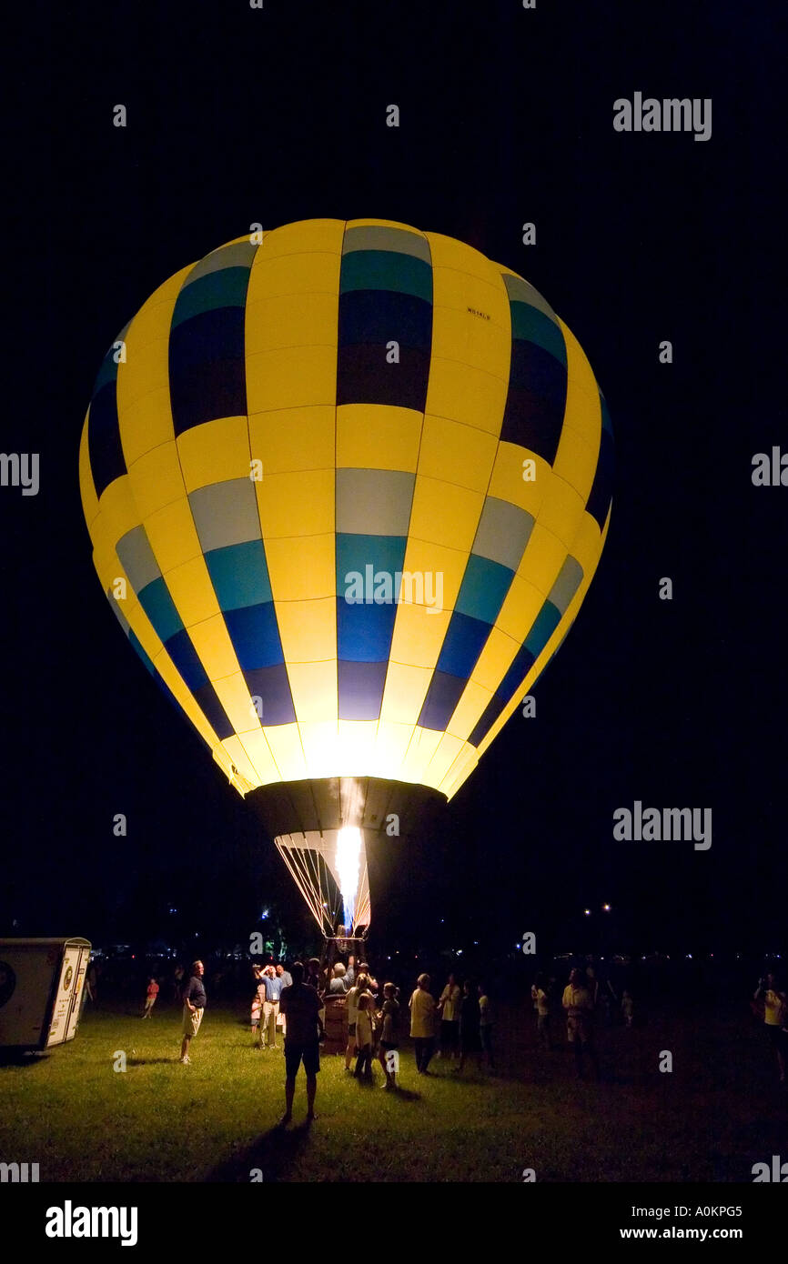 A hot air balloon glow at a balloon festival Stock Photo - Alamy