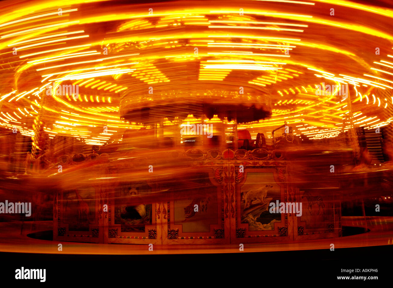Merry go round in action, London, UK Stock Photo - Alamy