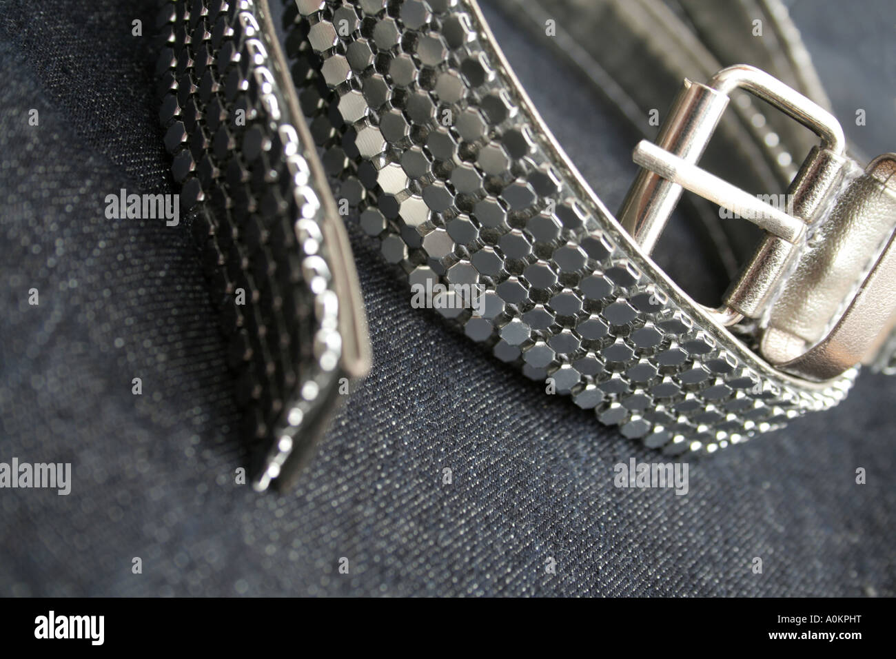 belt over denim back ground Stock Photo - Alamy