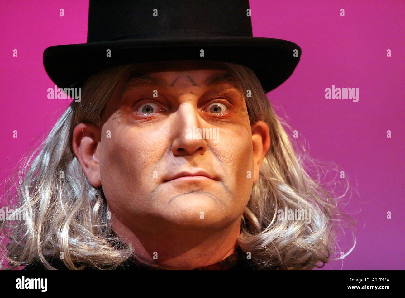 Actor dressed as an evil old man Stock Photo - Alamy