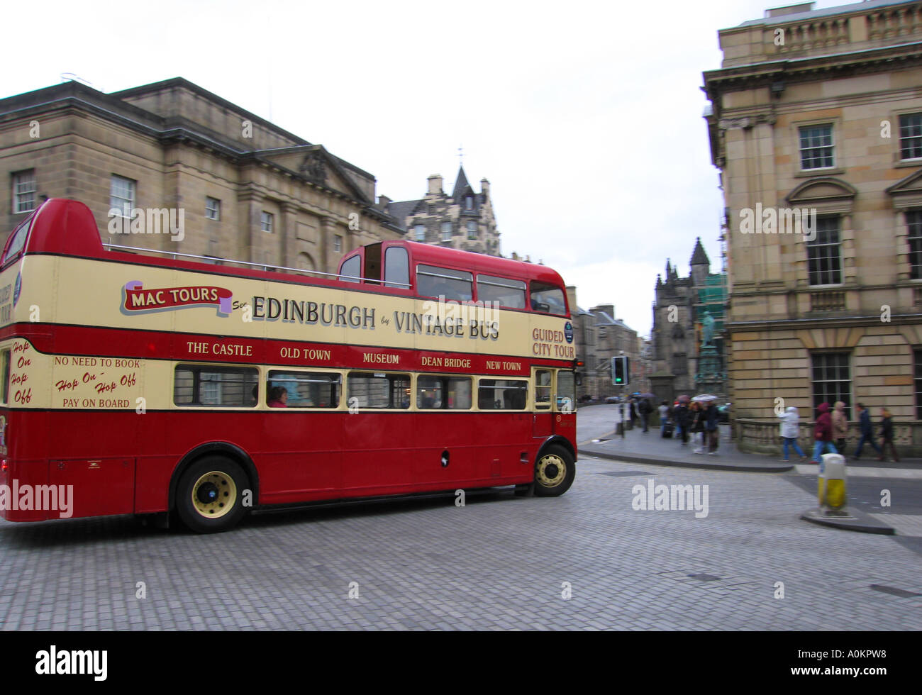 Red and cream Edinburgh open top double decker tour bus on the royal ...
