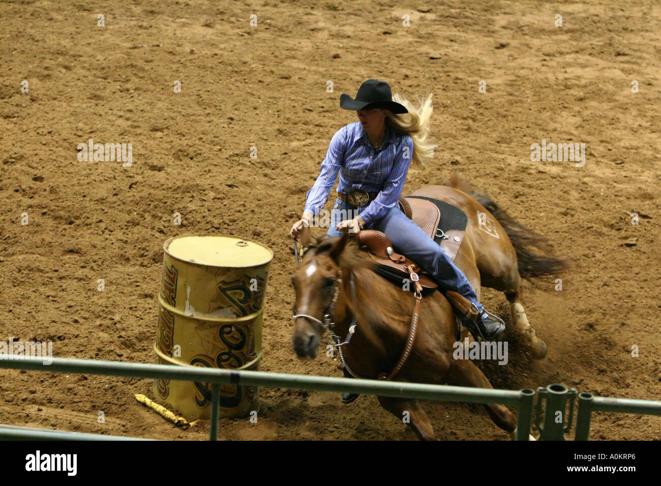Cowgirls compete in barrel racing at a rodeo Stock Photo - Alamy