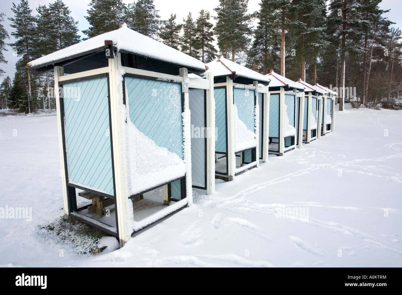 snowy beach huts in winter Stock Photo - Alamy