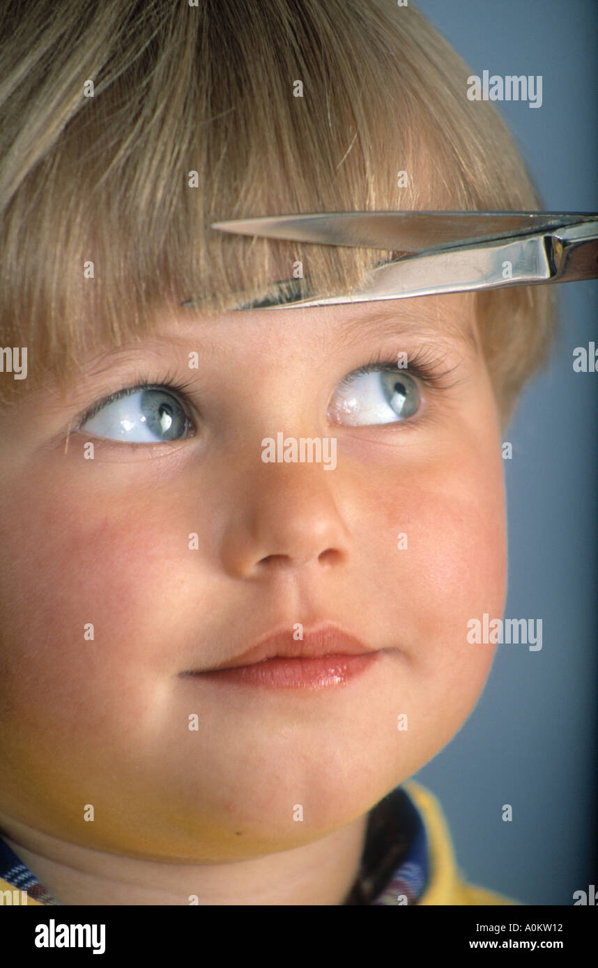 Child scissors 3 years hi-res stock photography and images - Alamy