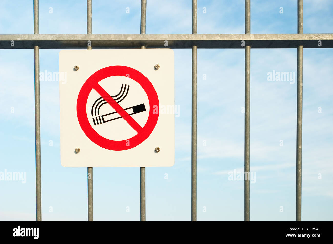 No smoking sign on an airport fence Stock Photo - Alamy
