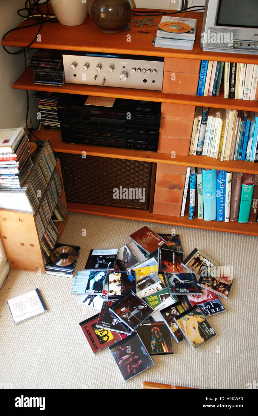 Pile of cds in front of stereo unit hi-res stock photography and images ...