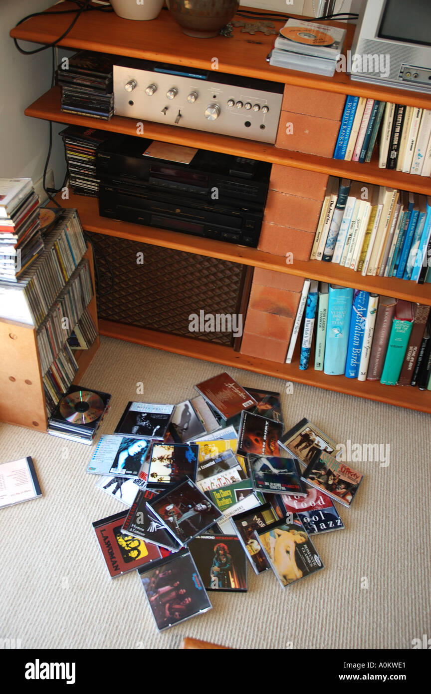 Pile of cds in front of stereo unit hi-res stock photography and images ...