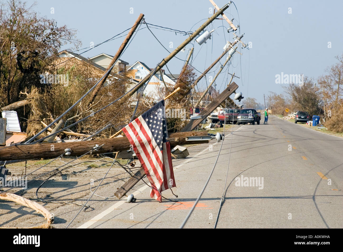 Downed power lines and an American Flag after Hurricane Katrina in ...