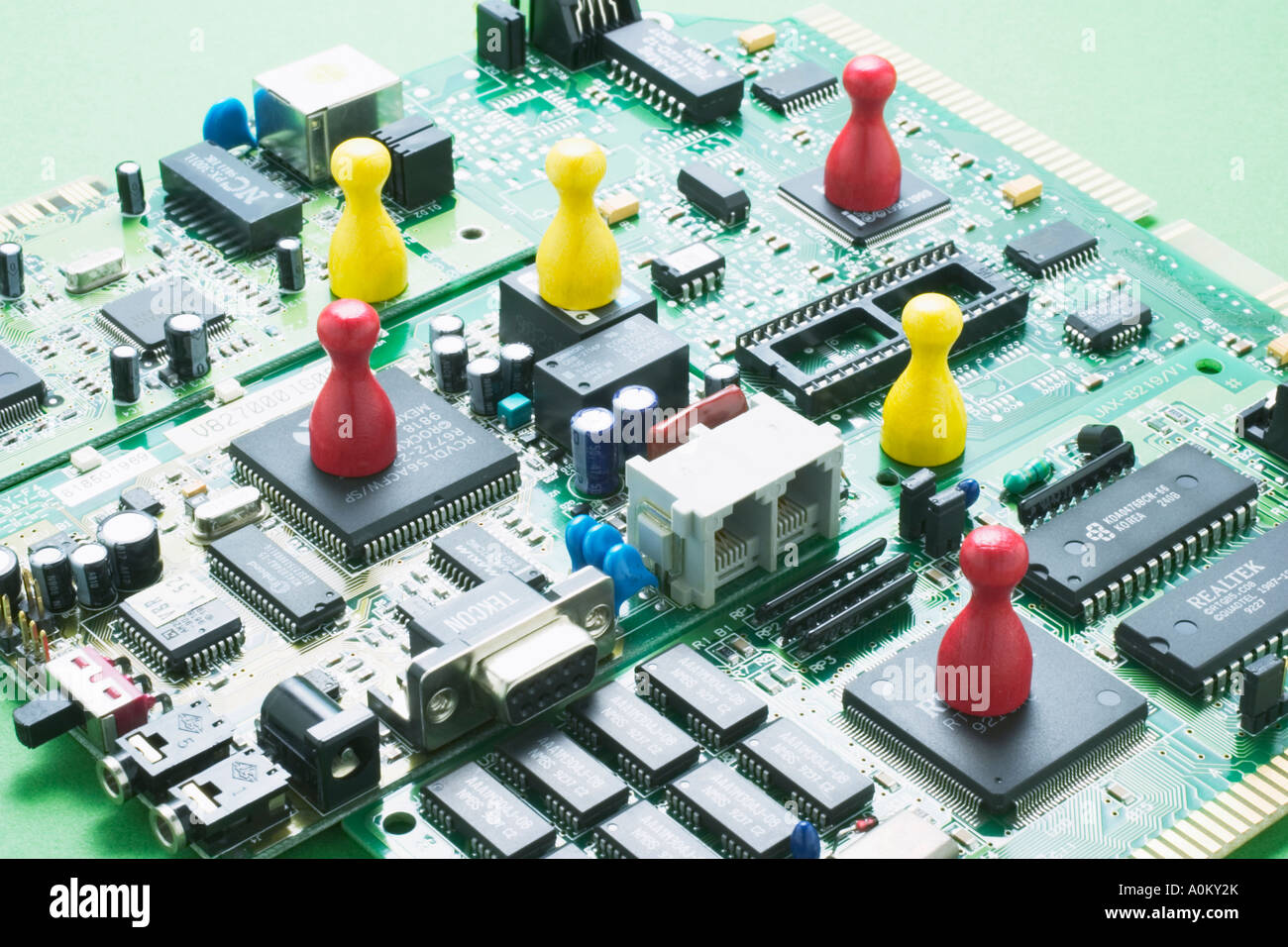 Game Pieces on Computer Circuit Board Stock Photo - Alamy