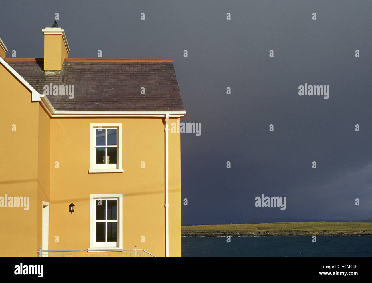 Donegal house before a storm Stock Photo - Alamy