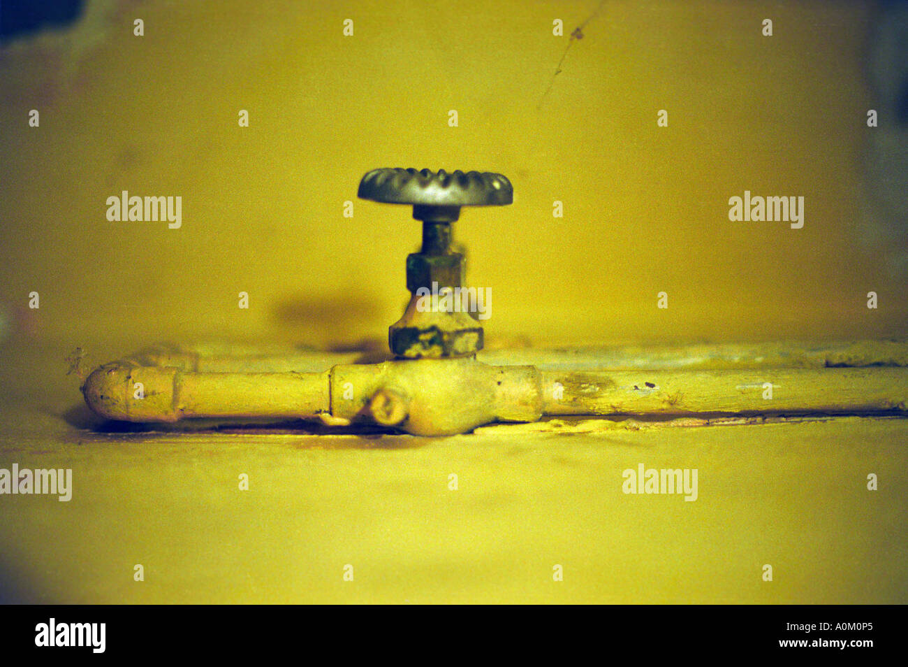 A valve on an old plumbing system Stock Photo - Alamy