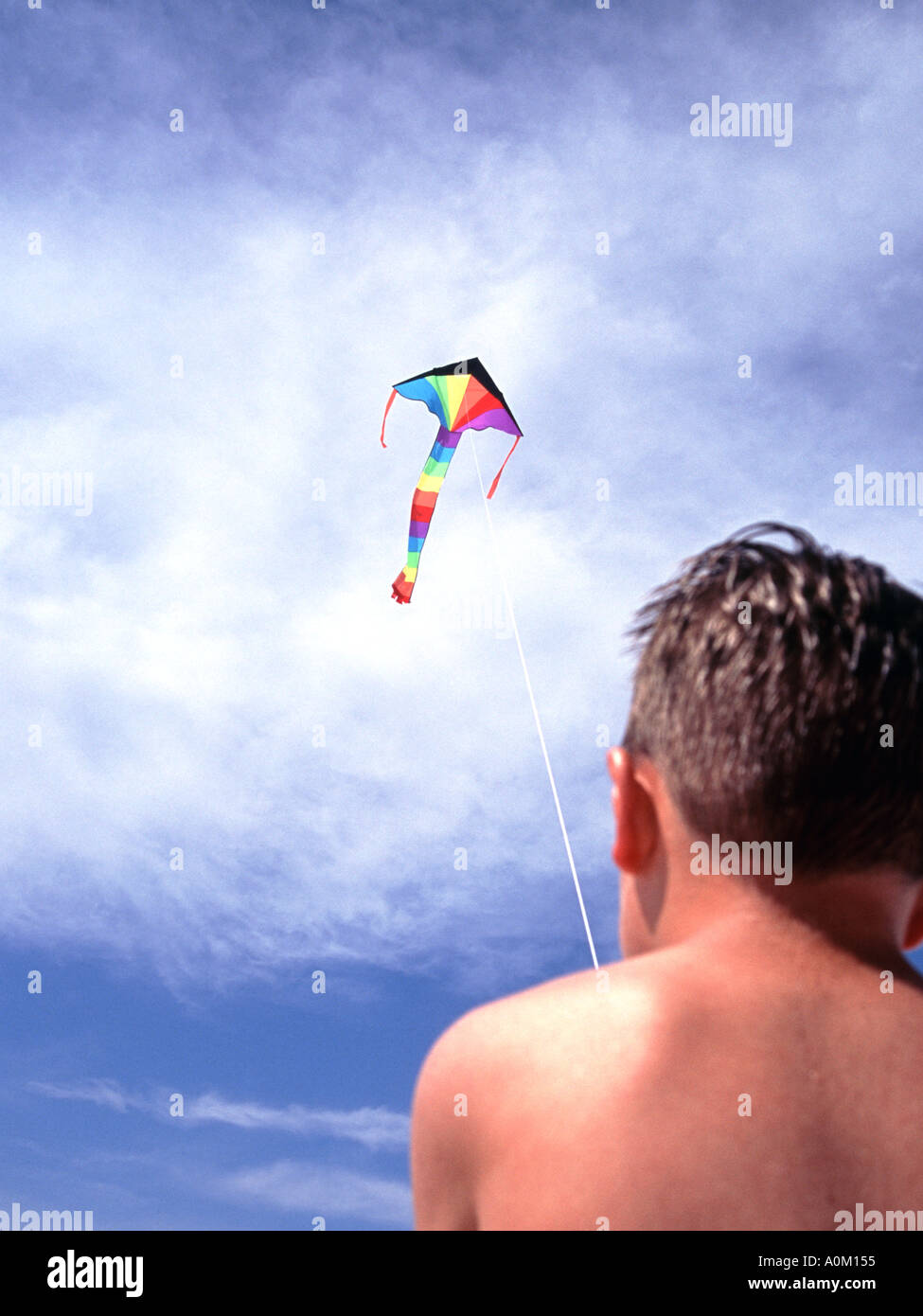 Boy flying a kite at Siesta Key Florida USA Stock Photo - Alamy