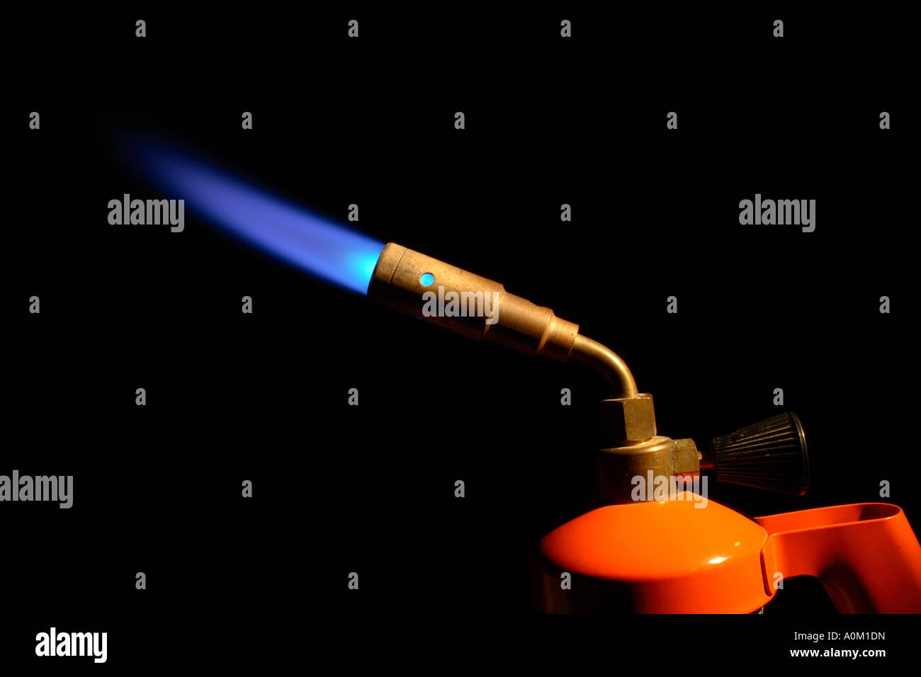A lit blowtorch Stock Photo - Alamy
