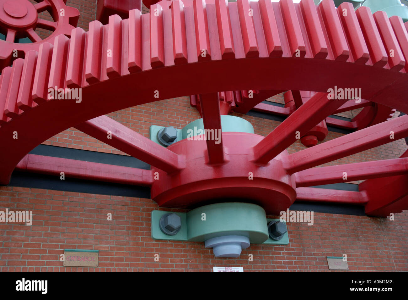 Giant gear wheels used as architecture decoration in facade of consumer ...