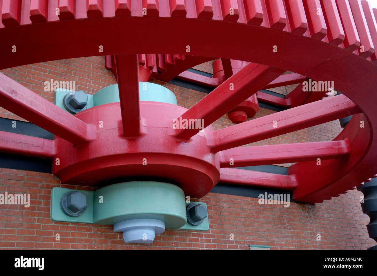 Giant gear wheels used as architecture decoration in facade of consumer ...