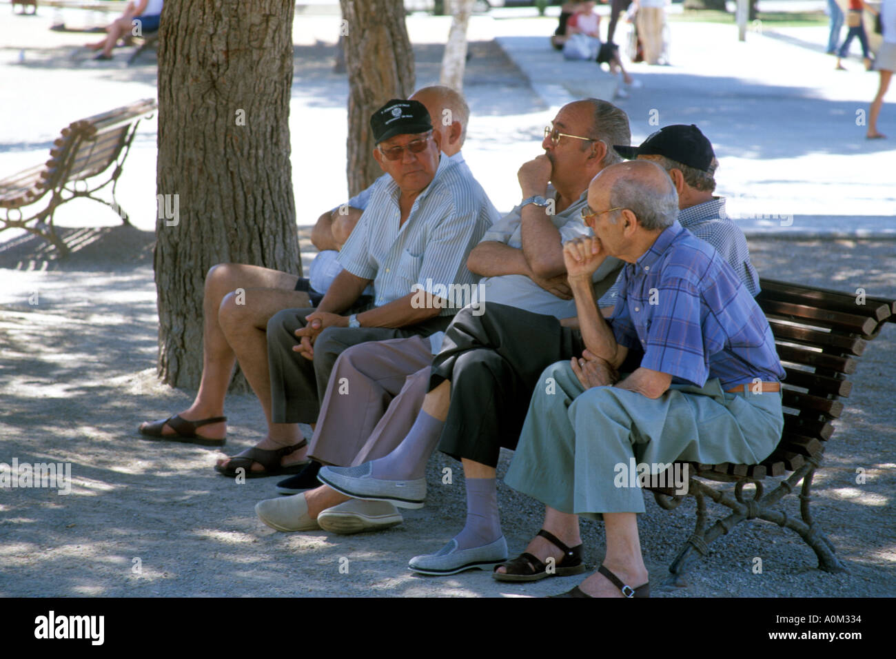 Local Men socialising in the main square of Mahon Menorca Stock Photo ...