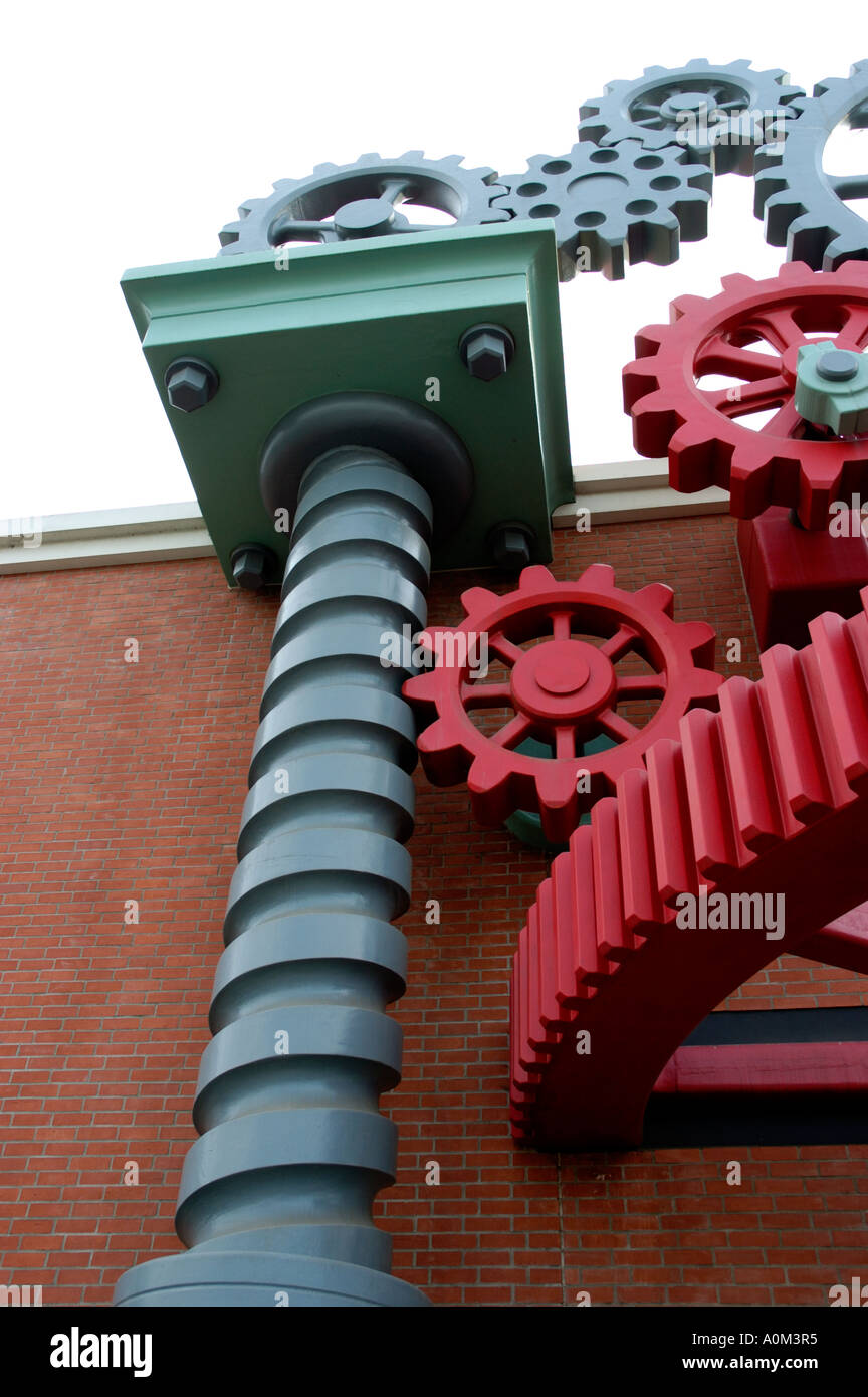 Giant gear wheels used as architecture decoration in facade of consumer ...