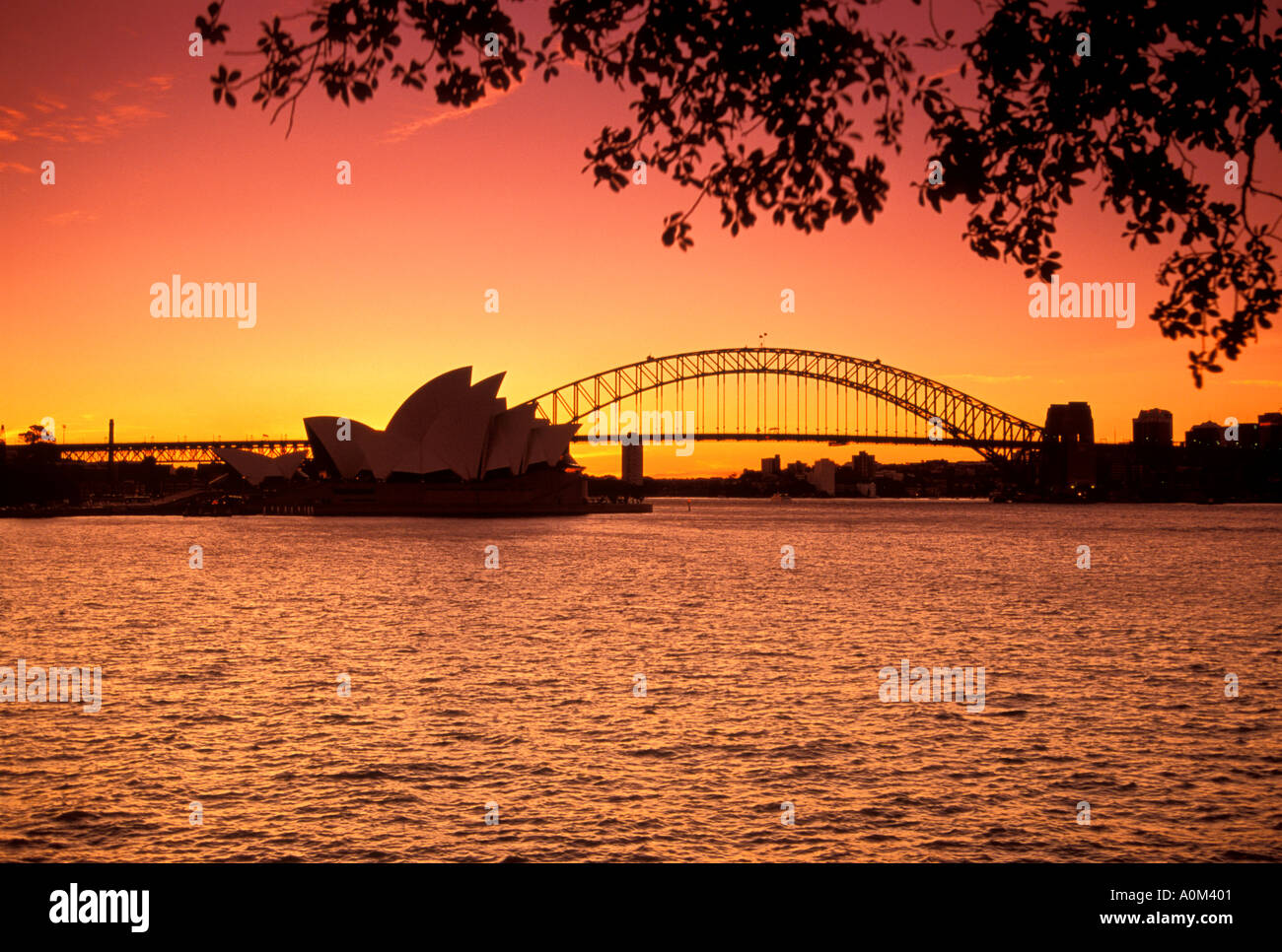 sunset over Sydney Opera House and Harbour bridge Stock Photo - Alamy