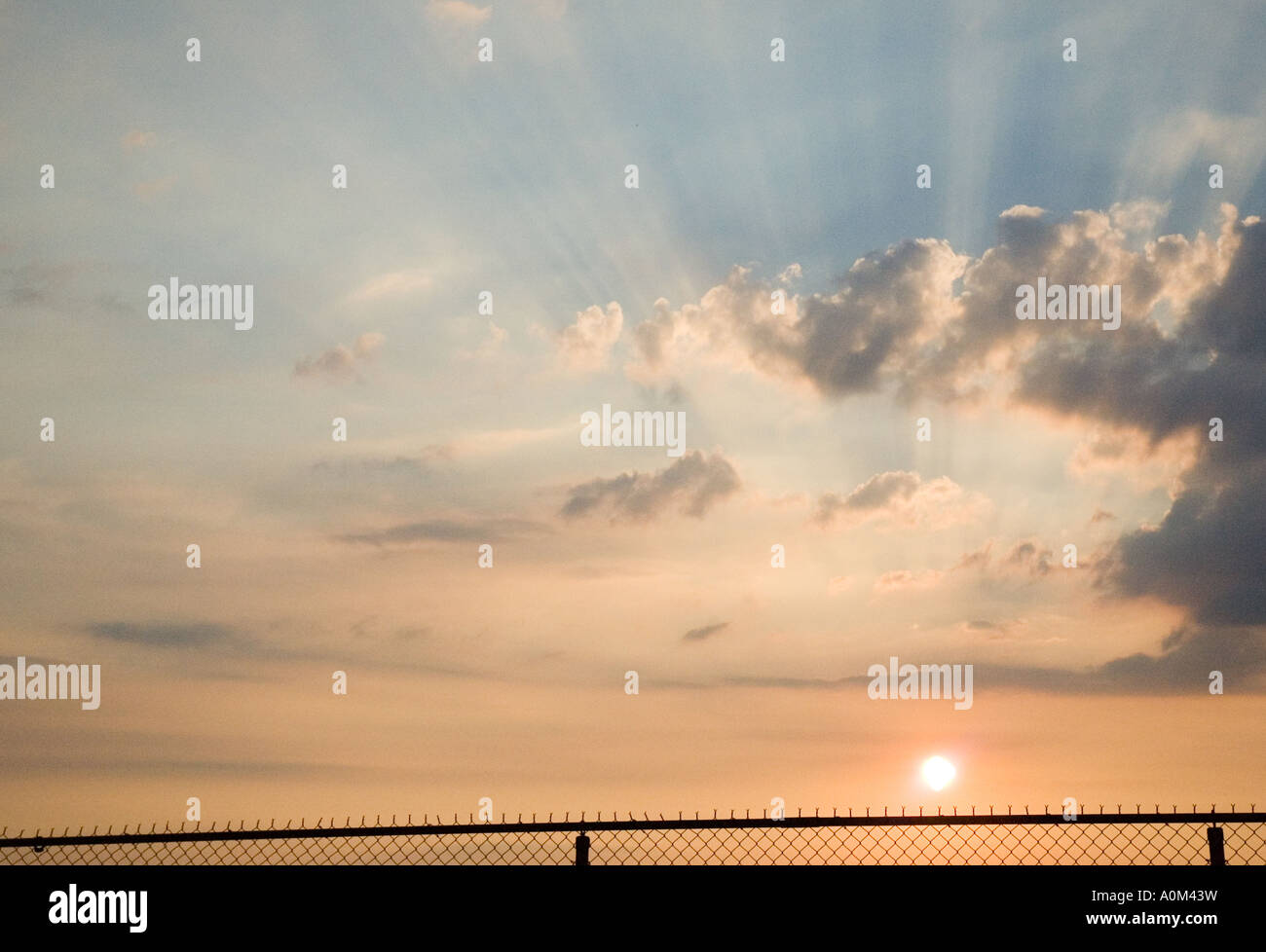 Dramatic cloud and setting sun Stock Photo - Alamy