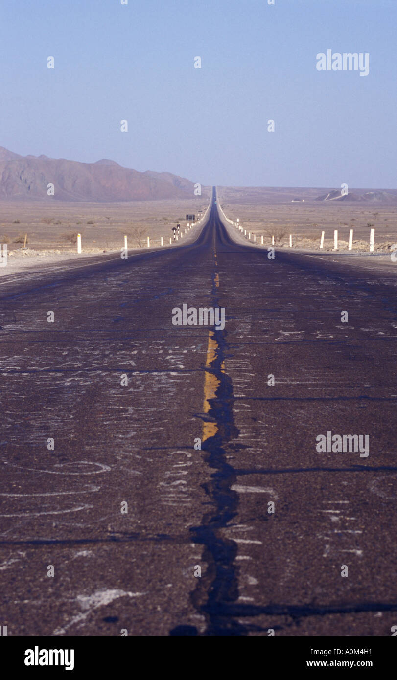 The road going through Nasca Lines and towards the town of Nasca in ...