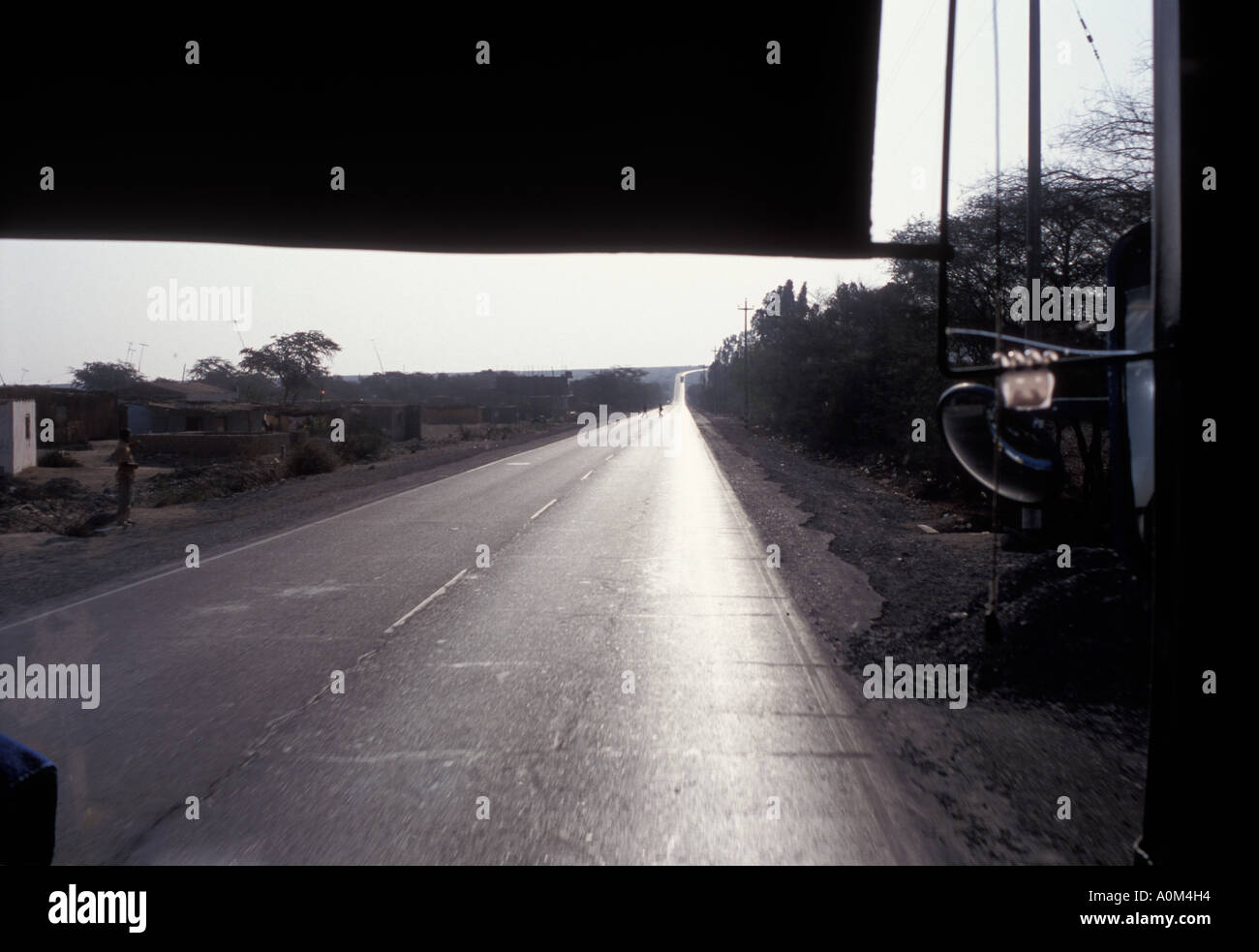 The road going through Nasca Lines and towards the town of Nasca in ...