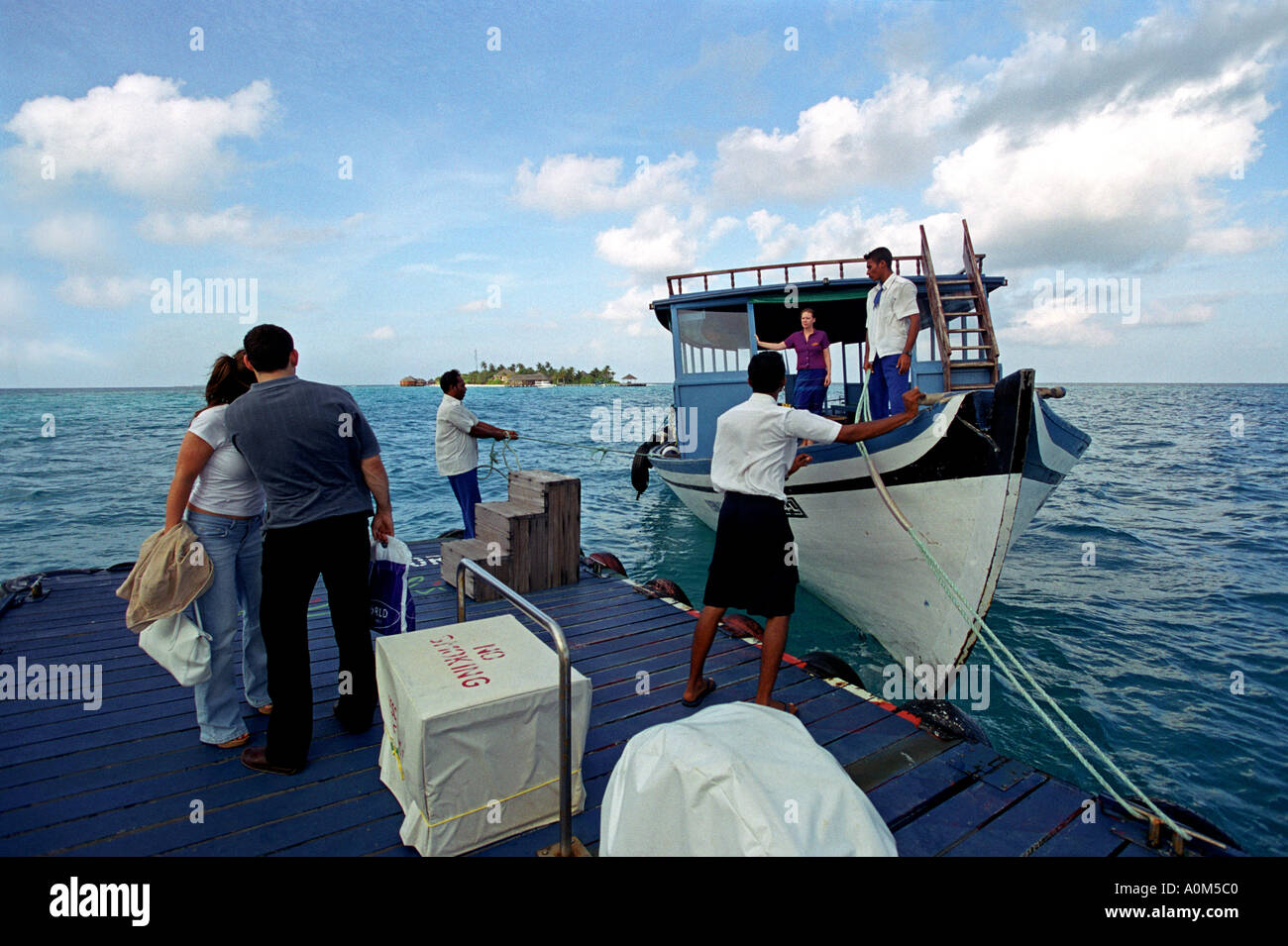 Seaplane transfer to boat at one of the island resorts in The Maldives ...