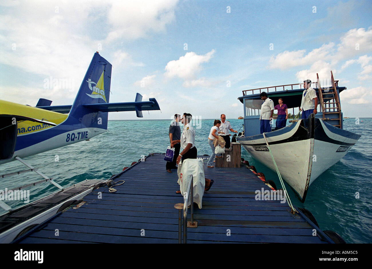 Seaplane transfer to boat at one of the island resorts in The Maldives ...
