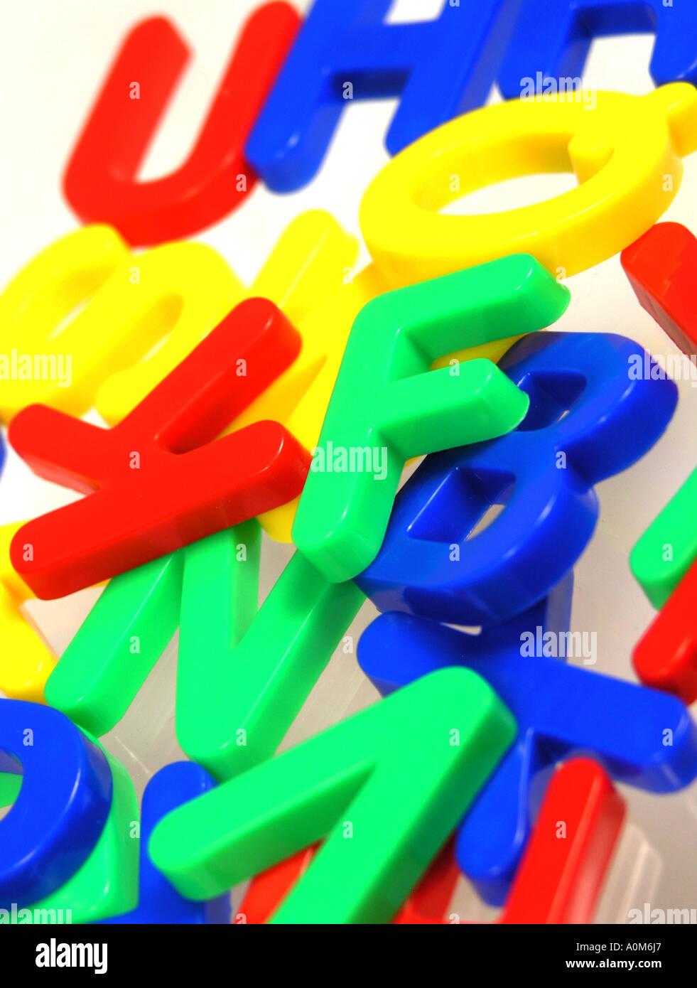 plastic fridge magnet numbers and letters in primary colours Stock ...