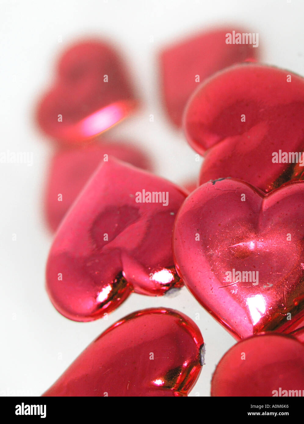 Pink Heart shaped shiny against white background Stock Photo - Alamy