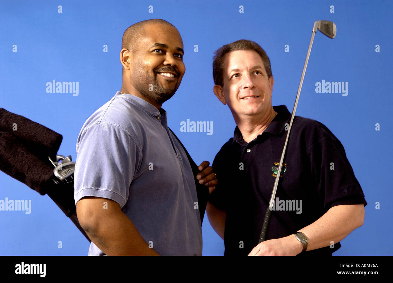Two men out on a golf course Stock Photo - Alamy