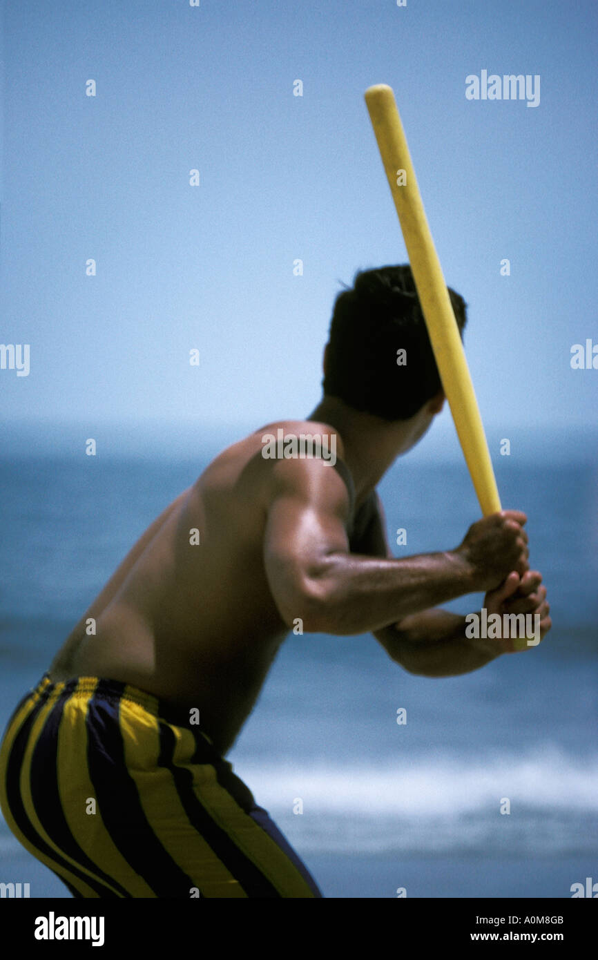 playing stick baseball on beach 1 one male caucasian man Stock Photo ...