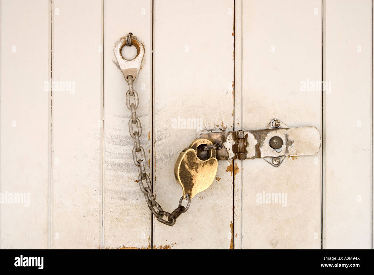 Padlock and Chain on Door Stock Photo - Alamy
