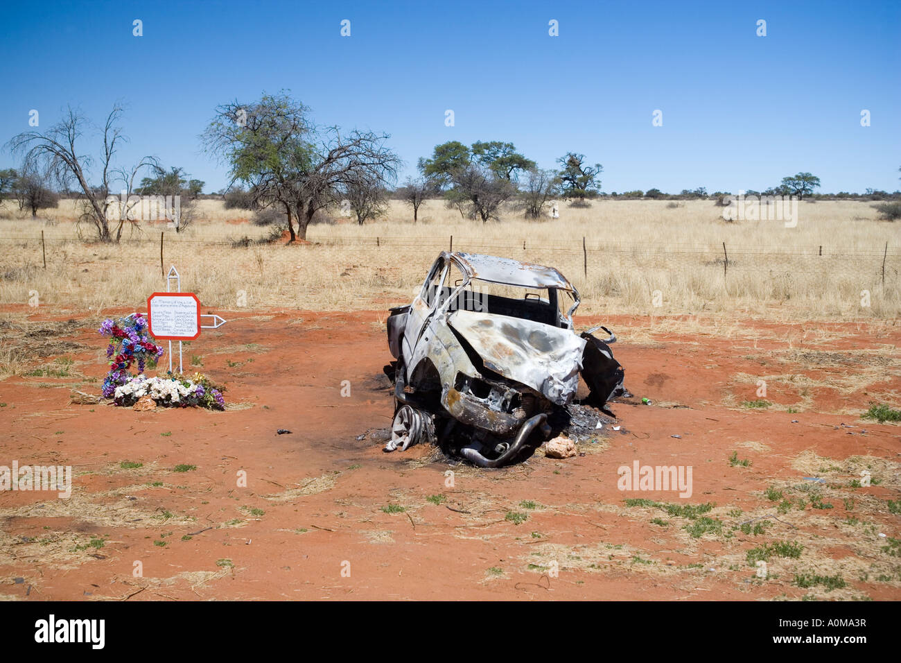 Remains of Crashed Car and Memorial Cross Namibia Stock Photo - Alamy