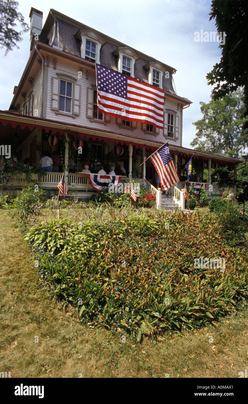 rural rustic country house large american flag Stock Photo - Alamy