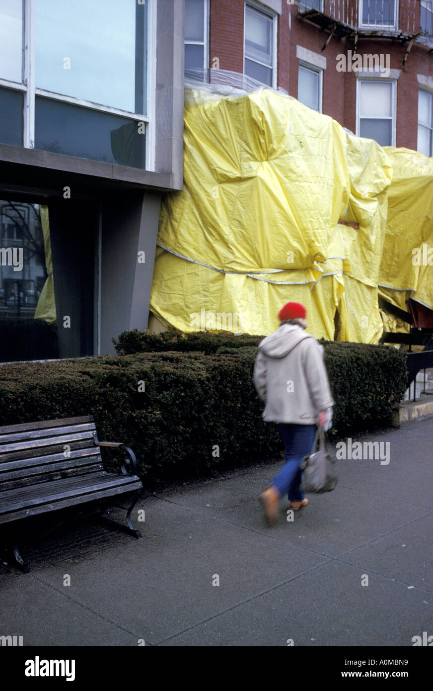 street design large yellow canvas covering building construction bench ...